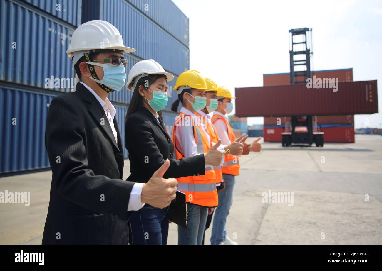 Foreman control Industrial Container Cargo freight ship at industry ...