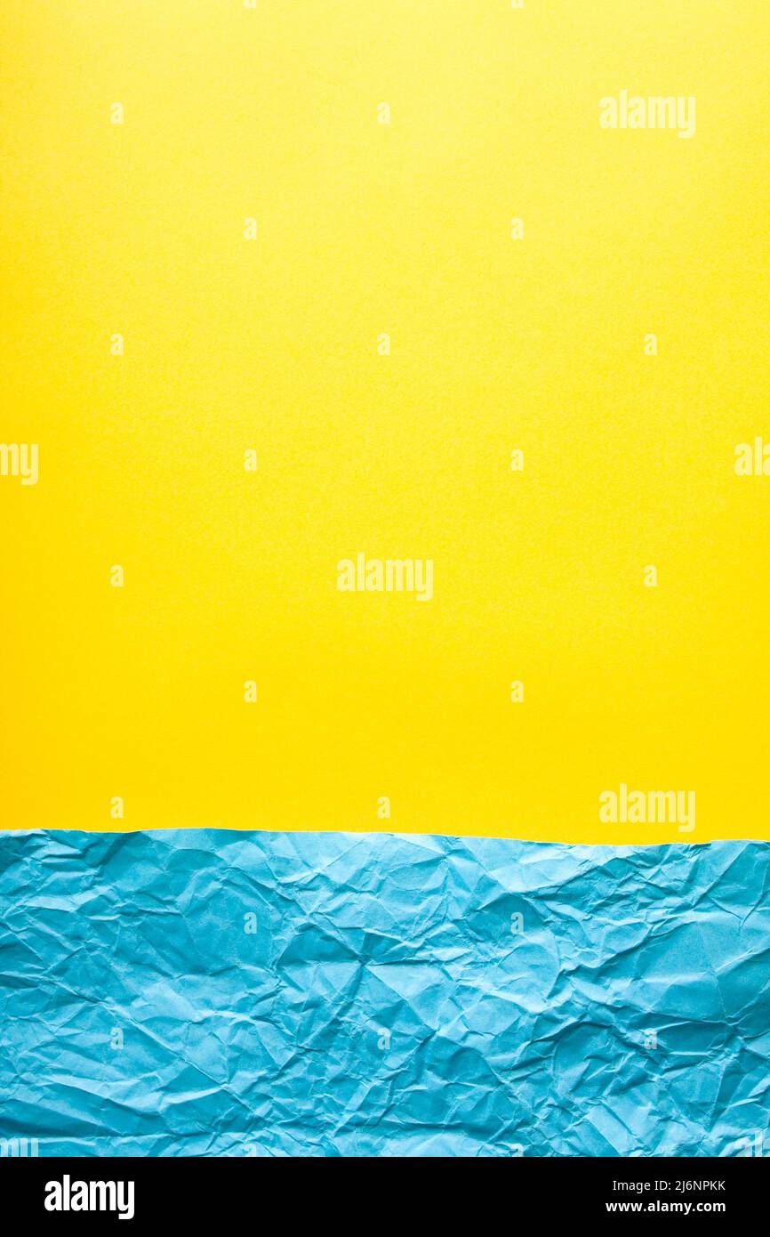 Minimalist paper background in blue and yellow Stock Photo - Alamy