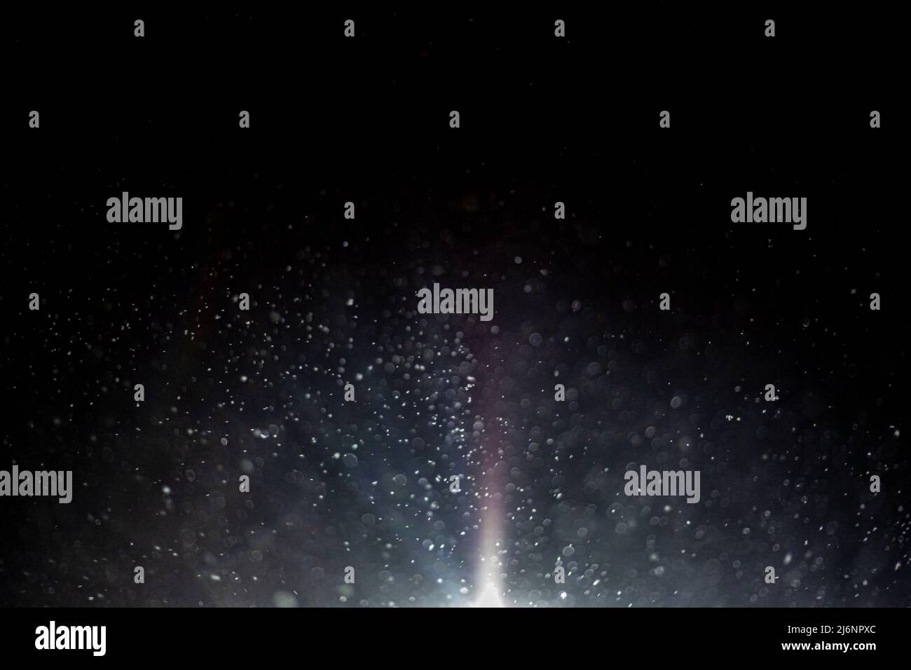 Strong snowstorm. It is snowing in the dark. Simple background with ...