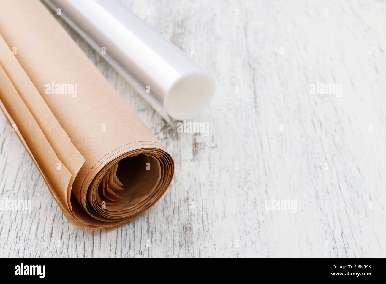 Paper or plastic stretch film wrapping, copy space Stock Photo - Alamy