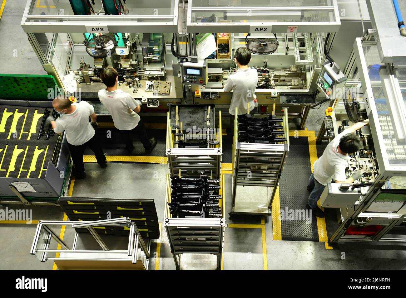 SUZHOU, CHINA - MAY 2, 2022 - Employees work overtime to produce auto ...