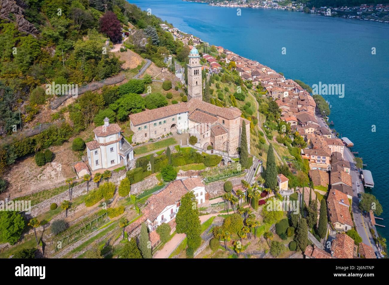 Aerial view of the small swiss village of Morcote and the church of ...