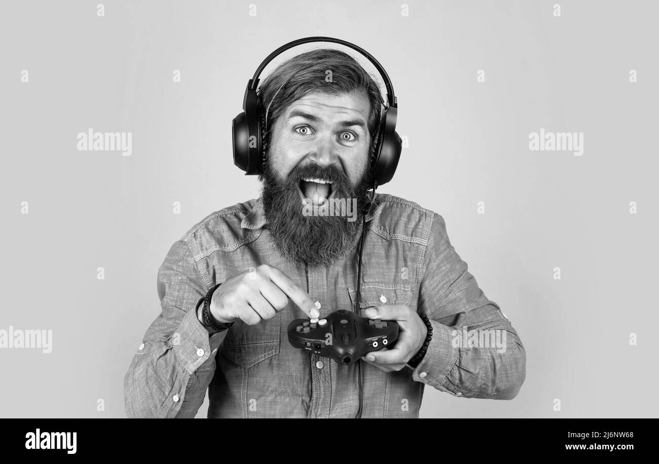 Emotional male playing video Black and White Stock Photos & Images - Alamy