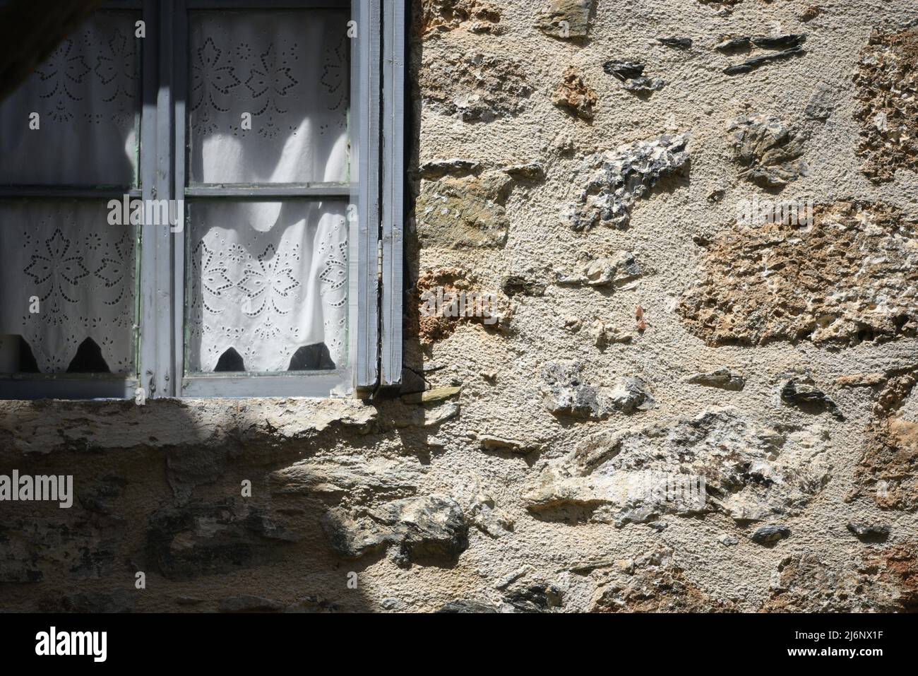 Antique light blue wooden window with traditional handmade cutwork ...