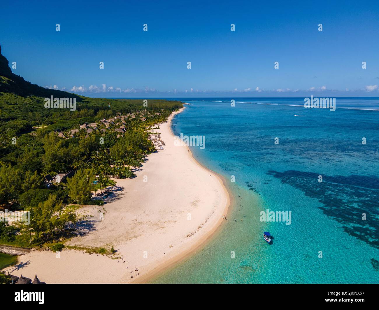 Le Morne beach Mauritius Tropical beach with palm trees and white sand ...