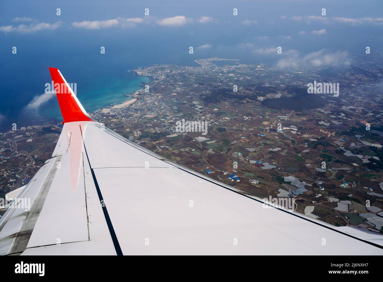 Aerial view of Jeju island and sea from airplane Stock Photo - Alamy