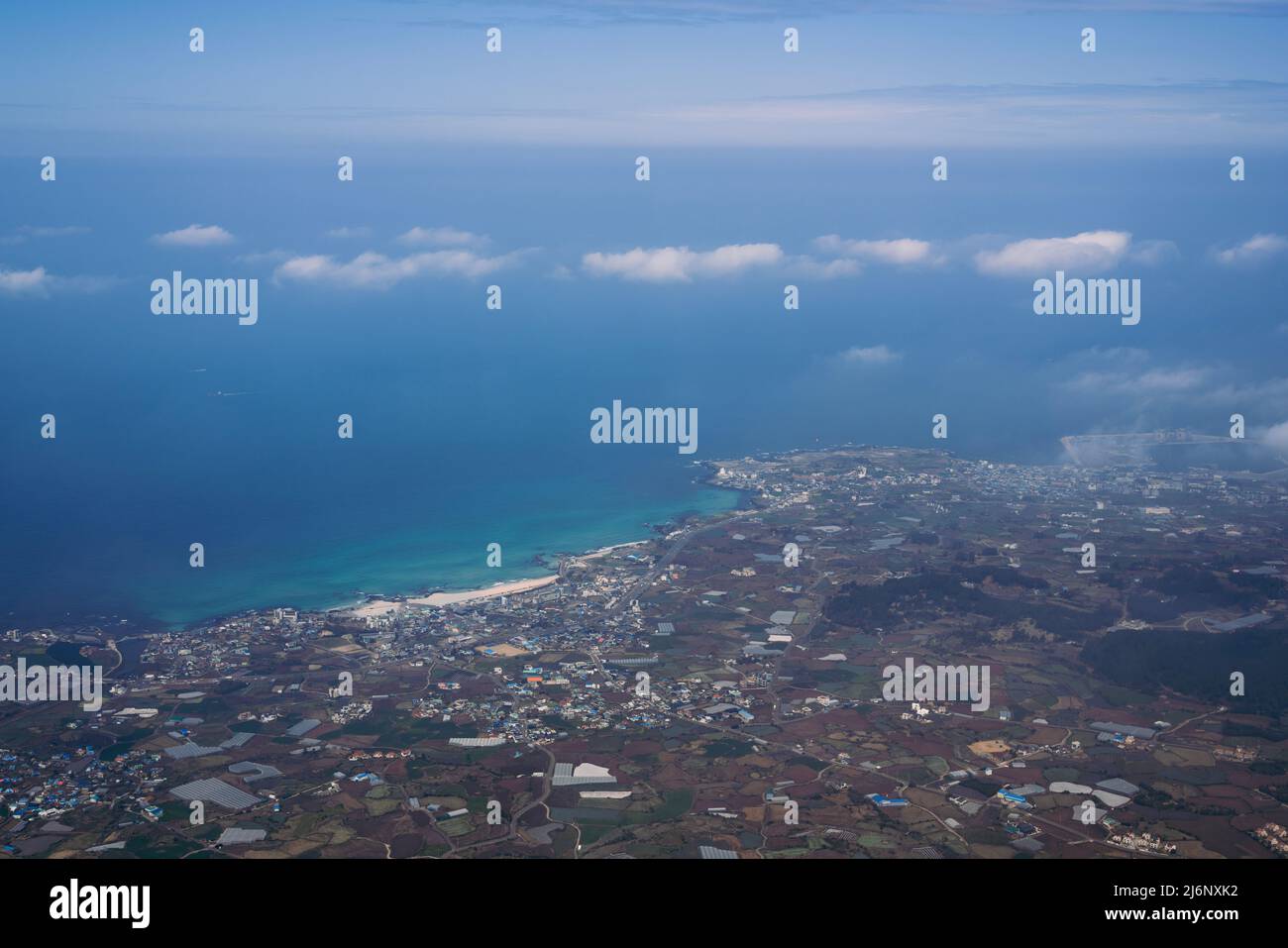 Aerial view of Jeju island and sea from airplane Stock Photo - Alamy