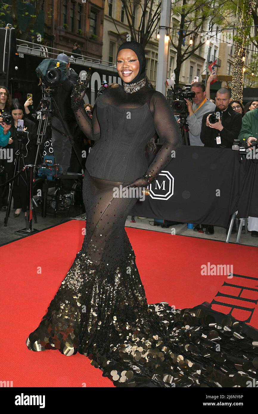 Precious poses for photographers at Departures from The Mark Hotel to ...