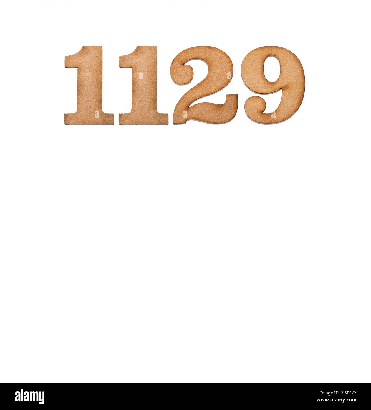 Number 1129 in wood, isolated on white background Stock Photo - Alamy