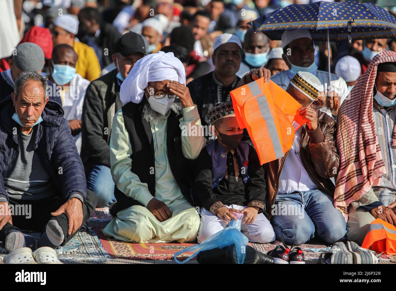 Muslims offer Eid al-Fitr prayers the end of the Muslim holy month of ...