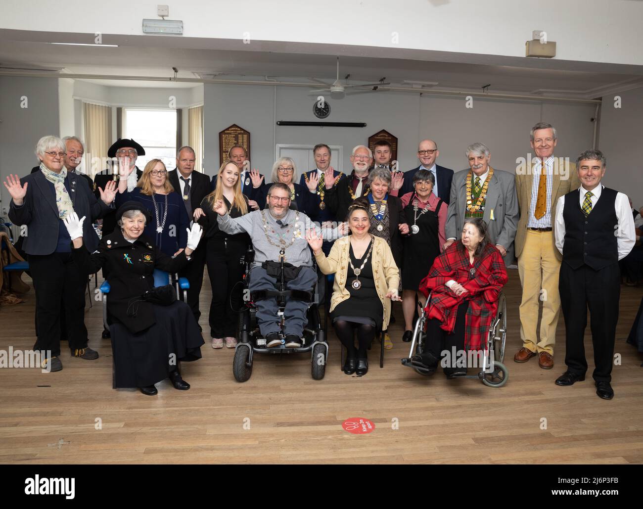 Dignitaries pose for a group photo in Camborne Community Centre during ...