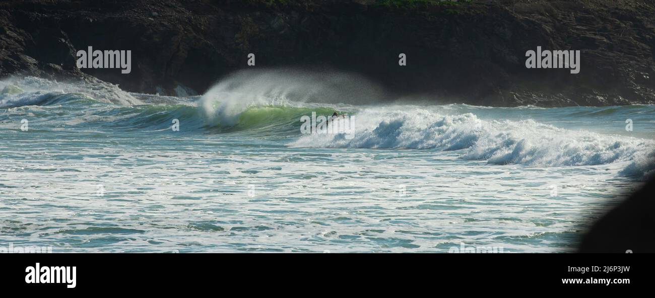 Surfing off the coast of Cornwall, UK Stock Photo - Alamy