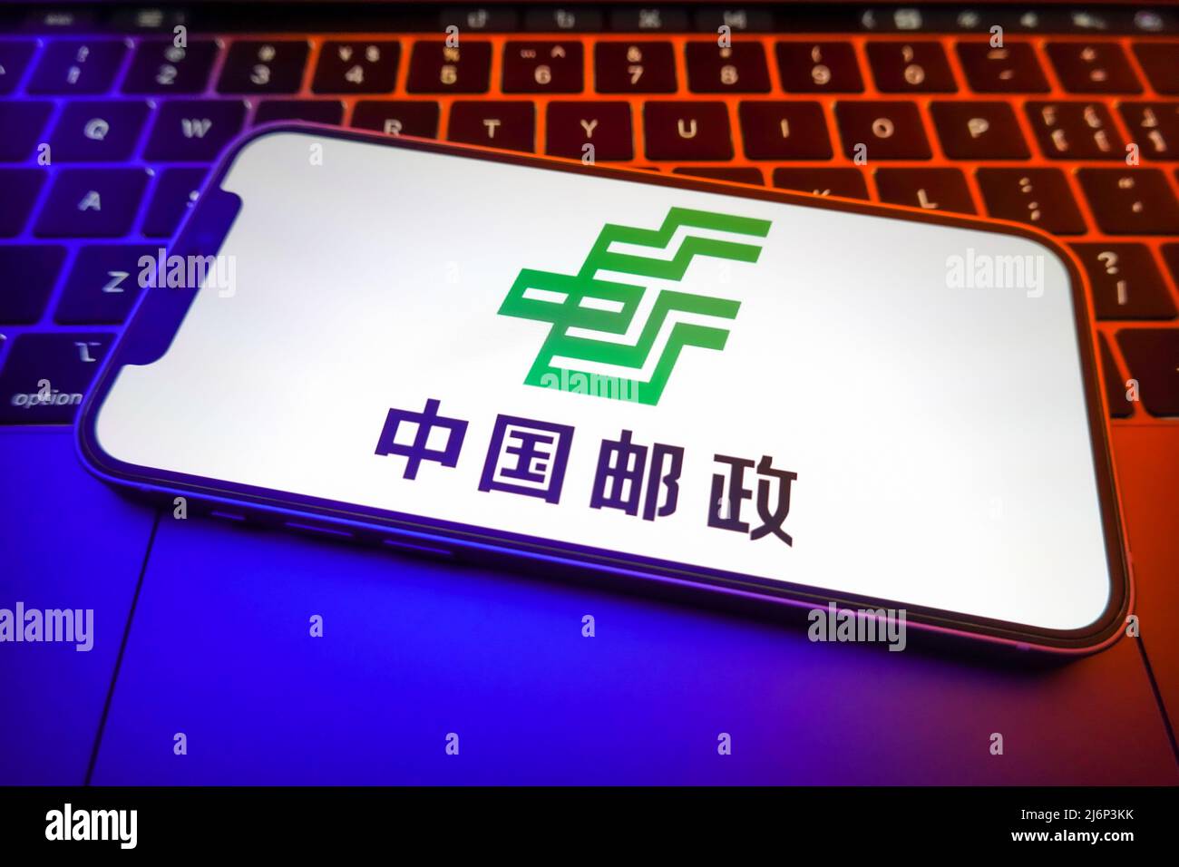 In this photo illustration, a China Post Group logo is displayed on the ...