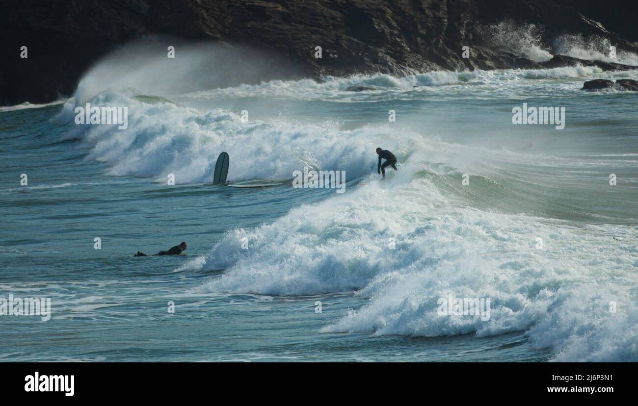 Surfing off the coast of Cornwall, UK Stock Photo - Alamy
