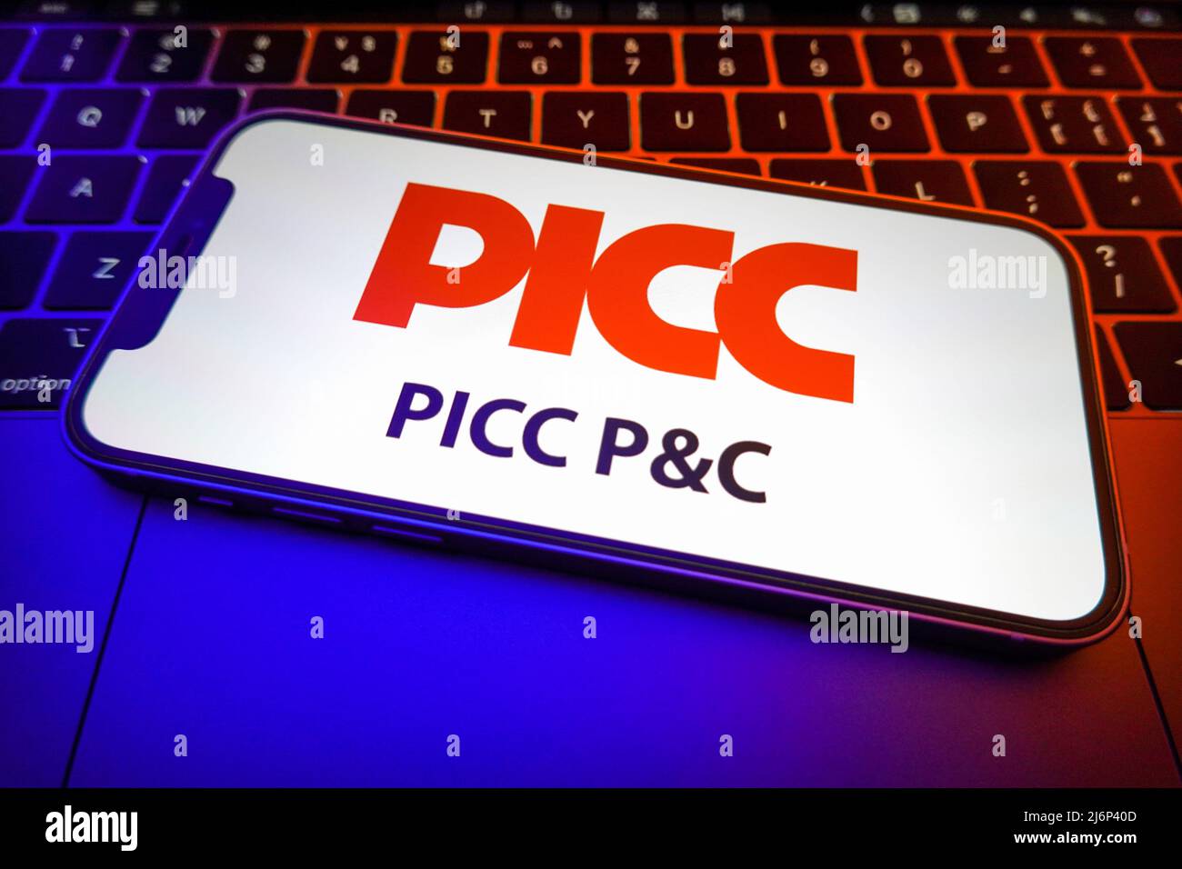 In this photo illustration, a logo of People's Insurance Co. Of China (PICC) is displayed on the ...