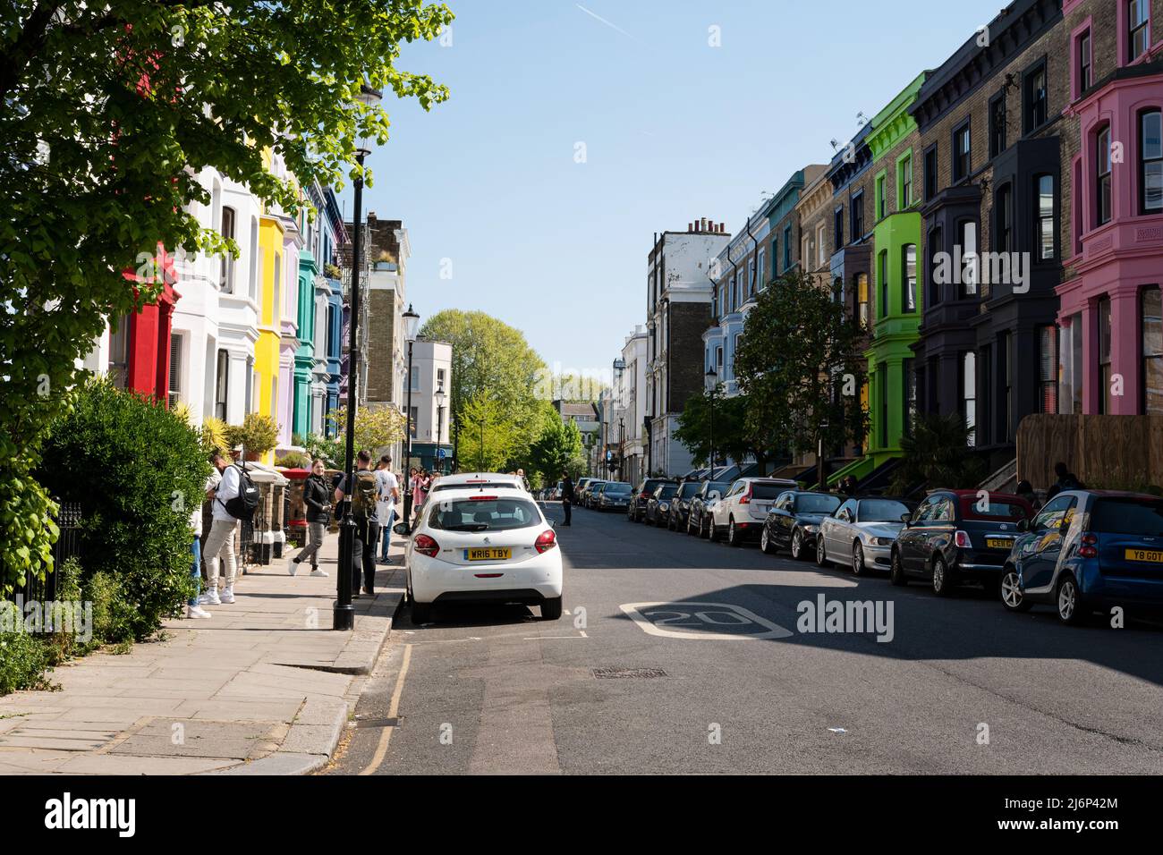 City street in Notting Hill, central London. Colorful residential ...