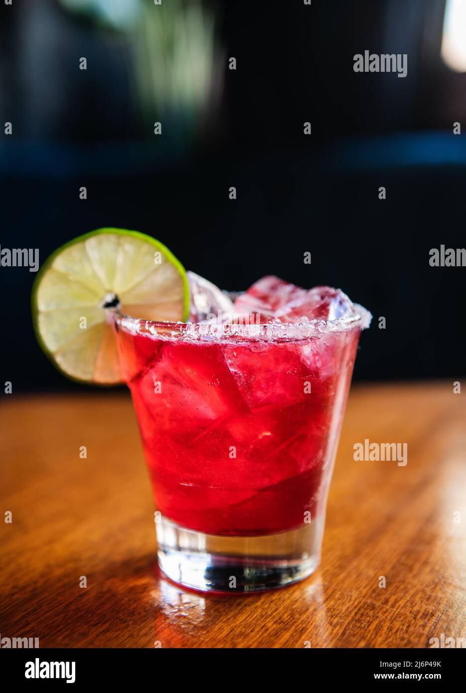Jamaica margarita with salt rim and lime garnish Stock Photo - Alamy