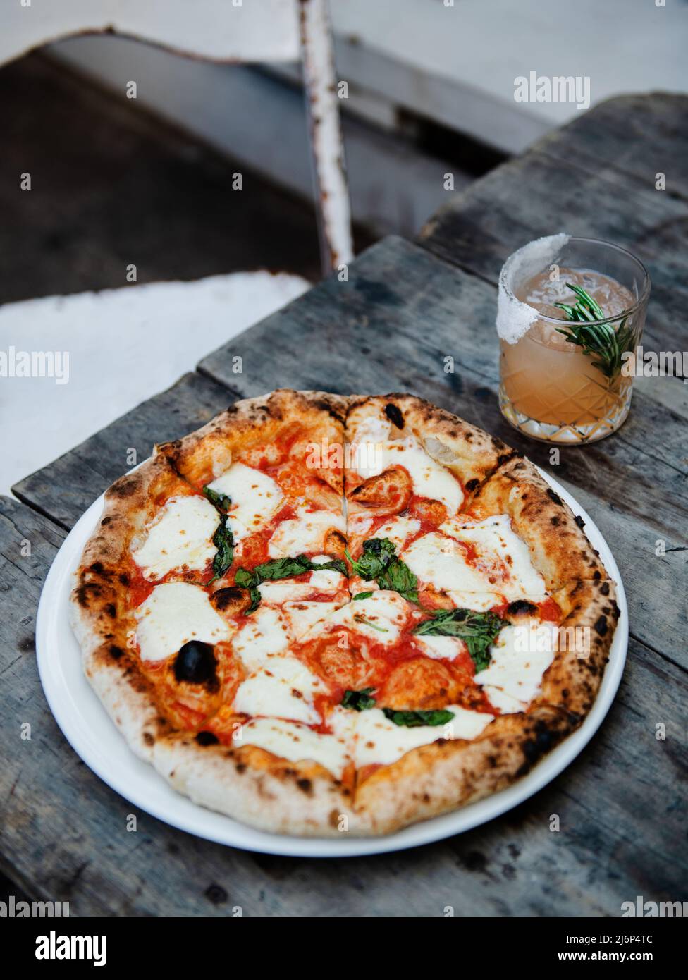 Gourmet Margherita pizza with a grapefruit cocktail Stock Photo - Alamy