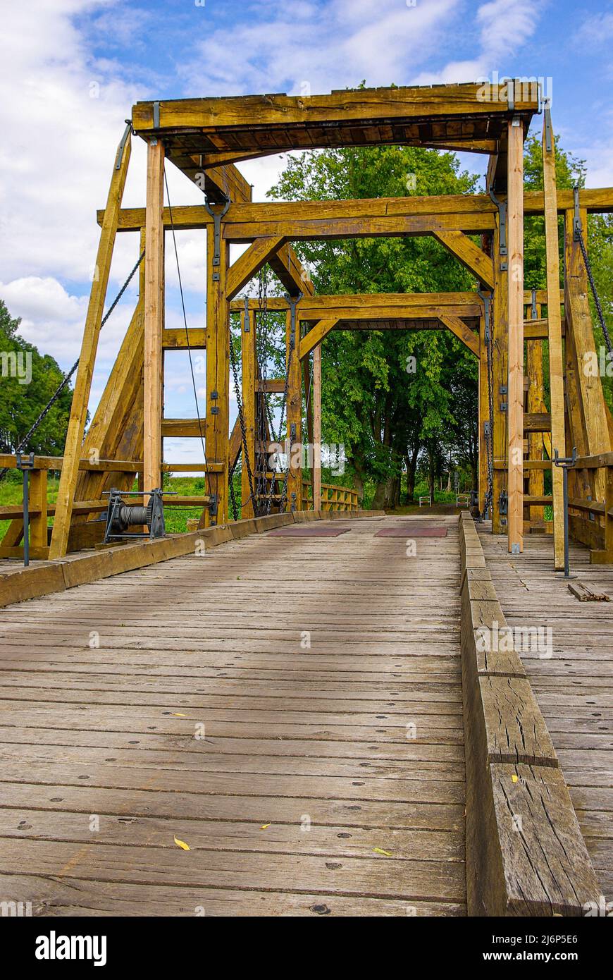 Listed wooden bascule bridge spanning the Trebel near Nehringen ...