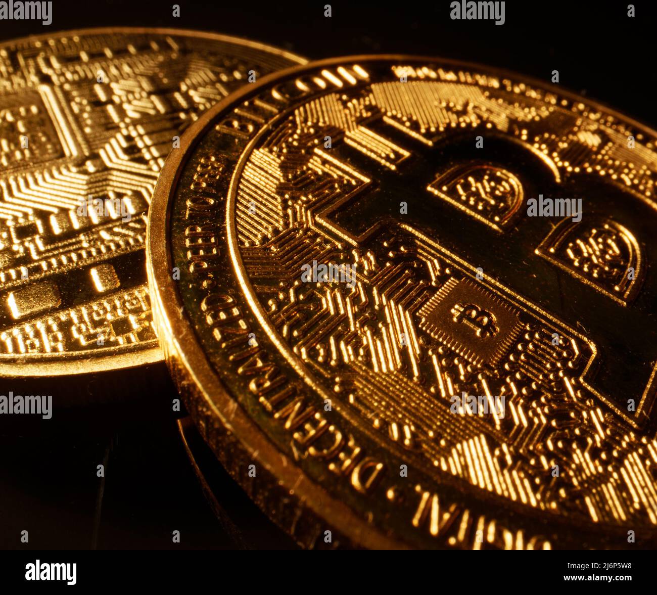 Macro view of golden bitcoin on microchip Stock Photo - Alamy