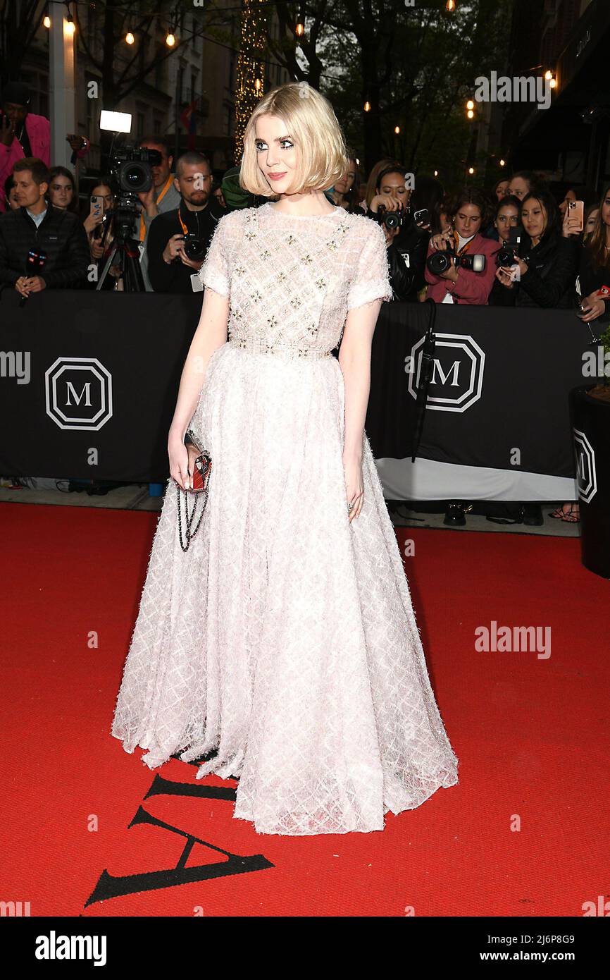 Lucy Boynton in Chanel poses for photographers at Departures from The ...