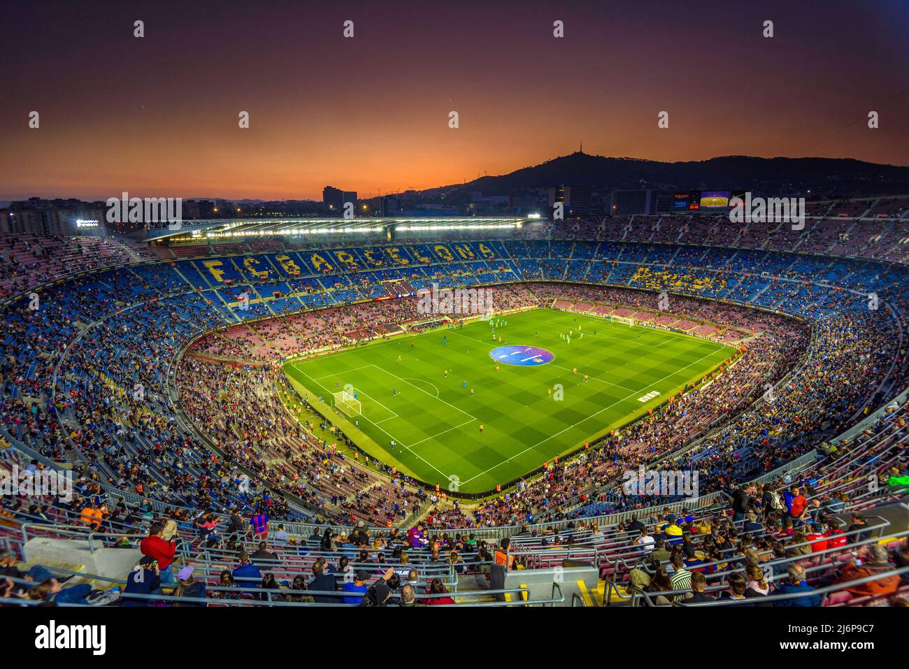 Panoramic view of the Camp Nou stadium at sunset, on a match day of the ...