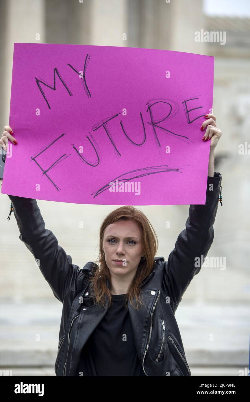 A pro-choice activist holds a sign outside the U.S. Supreme Court after ...