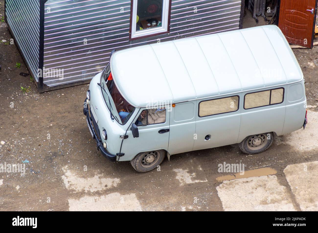 Kemerovo, Russia - 24 june 2021. An old-fashioned UAZ minibus stands ...