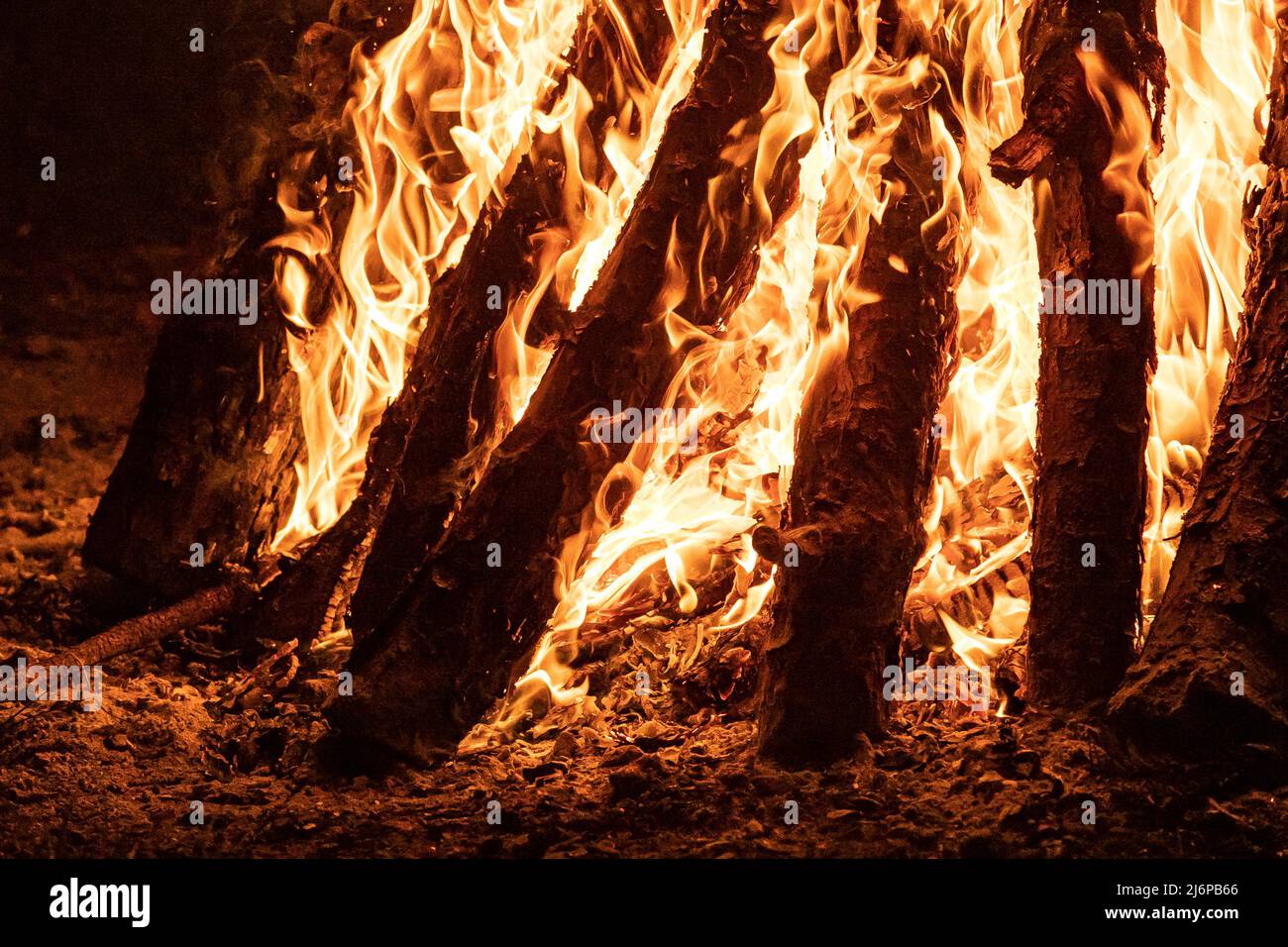 Bonfire with emphasis on the shape of the fire in its orange color ...