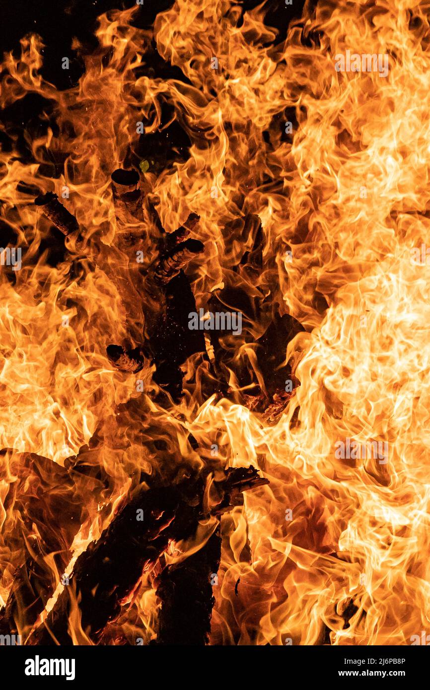 Bonfire with emphasis on the shape of the fire in its orange color ...