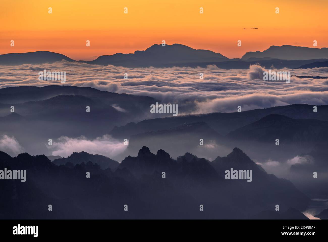 Winter sunset seen from the Rasos de Peguera mountain, in Berguedà ...