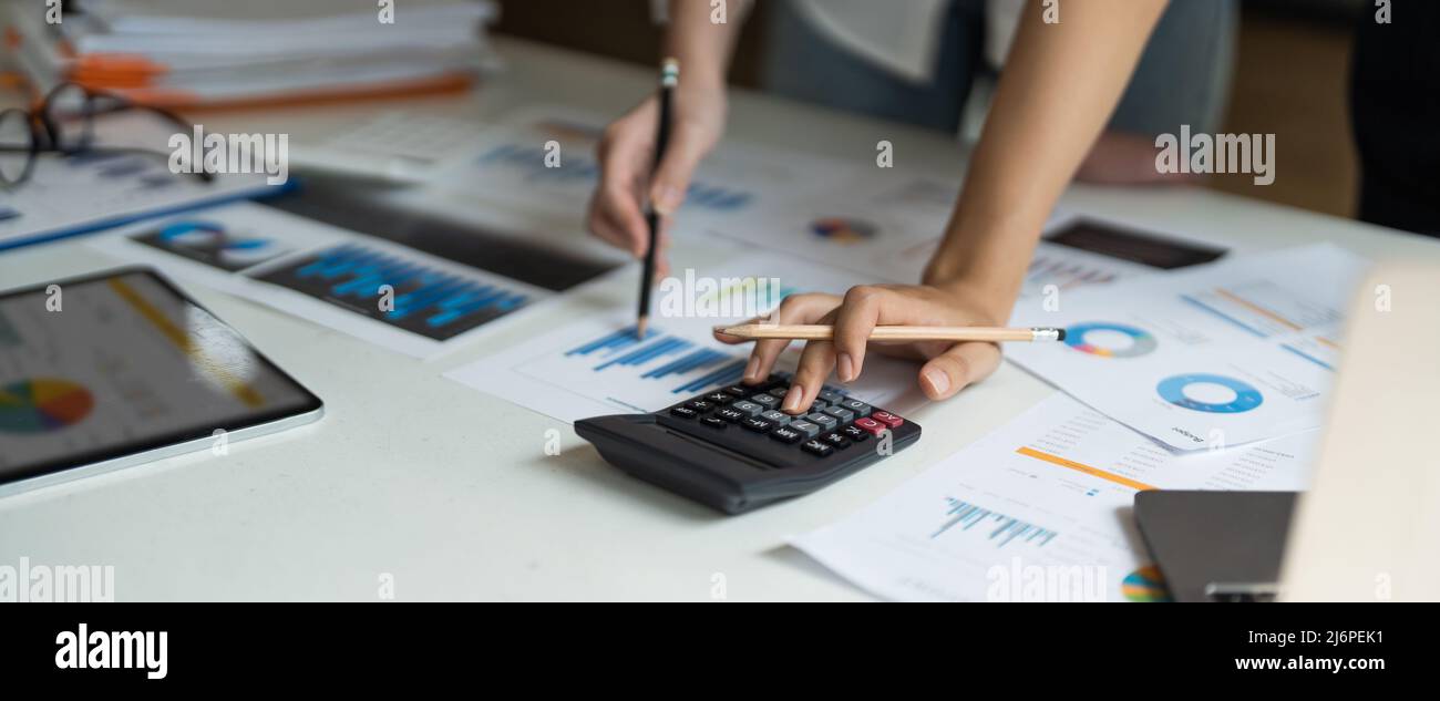 Close up accountant bookkeeper woman working about financial with ...