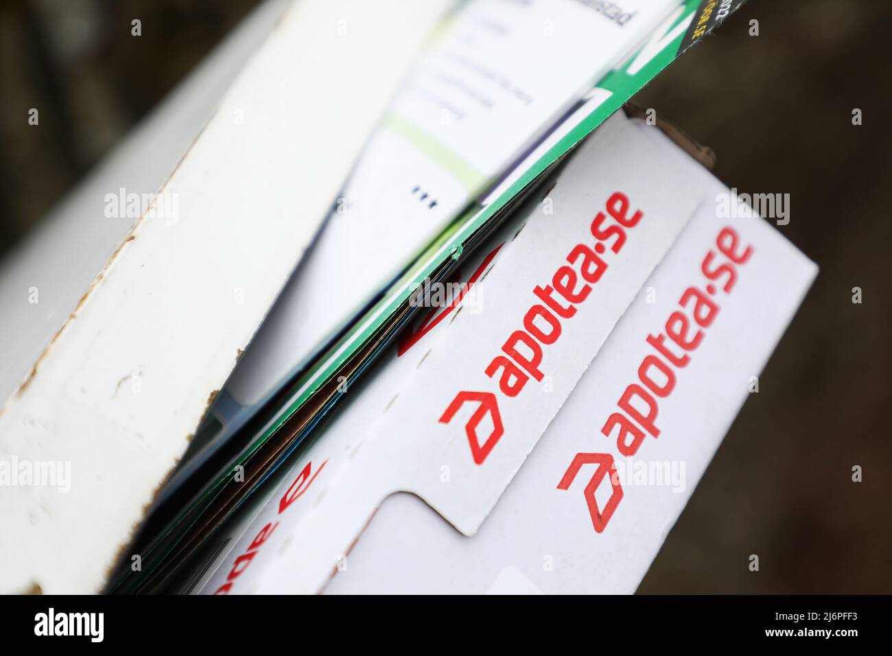 Package from the online pharmacy Apotea AB delivered in a mailbox at a ...