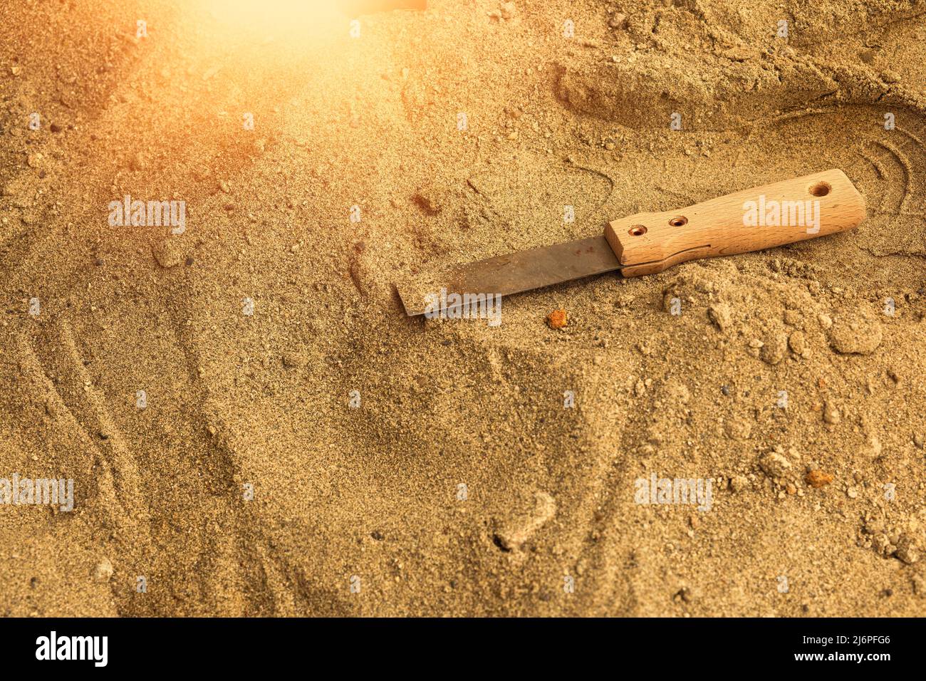 Skeleton and archaeological tools in the sand.Digging for fossils Stock ...