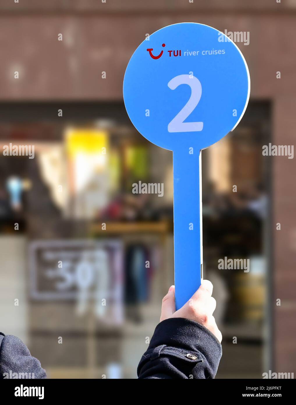 Tour guide holding flag hi-res stock photography and images - Alamy