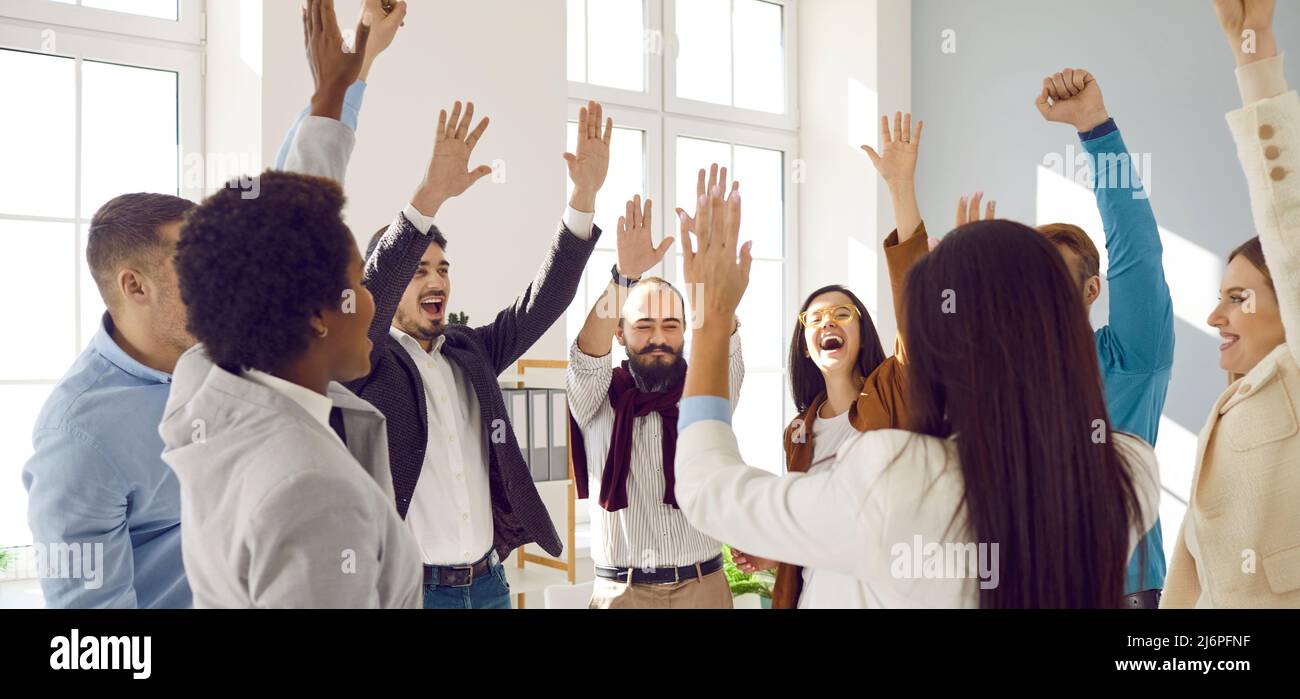 Overjoyed business team cheering, celebrating good sales result, and ...