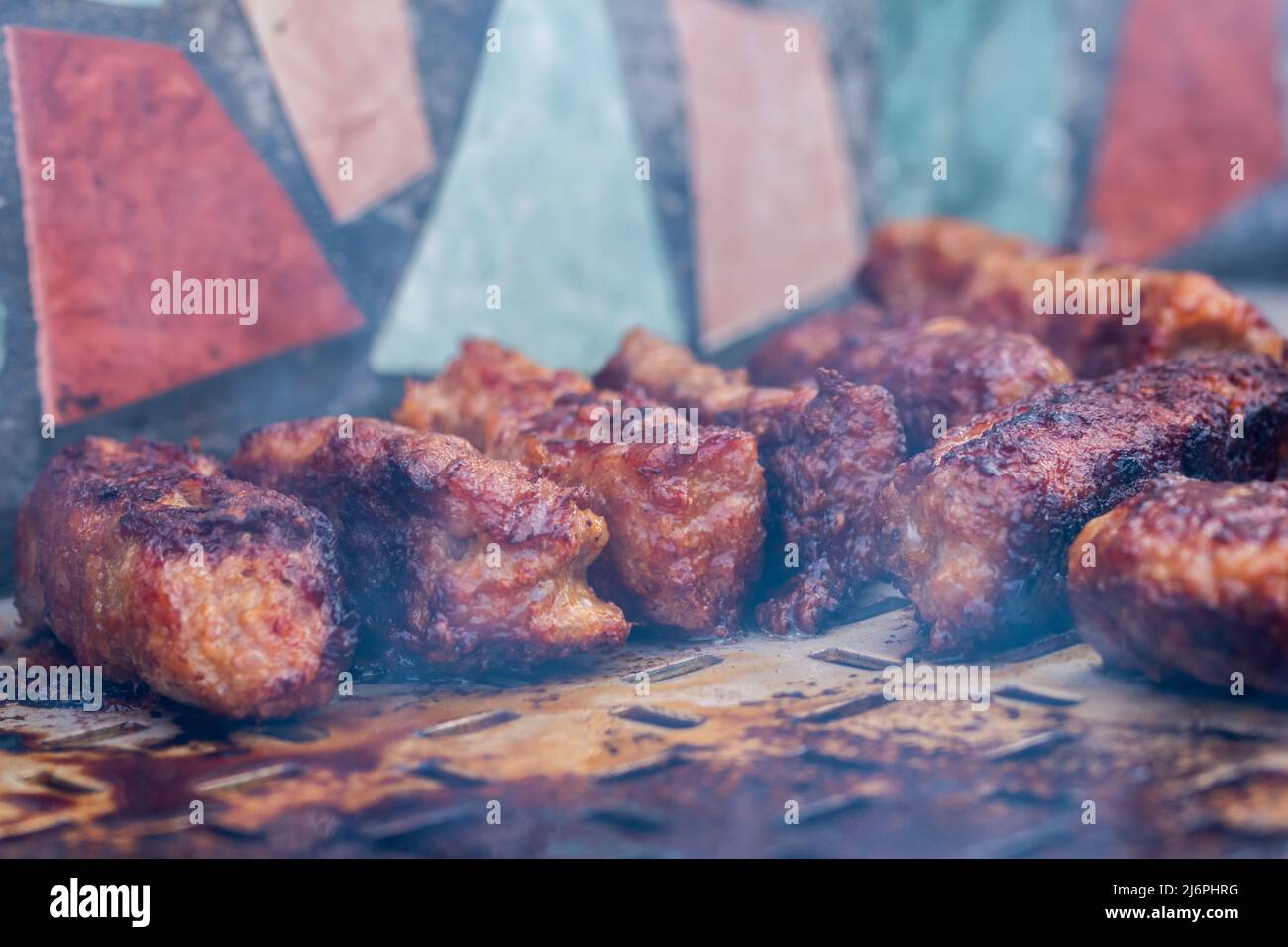 Traditional Romanian food called "mici" which consist of pork meat ...