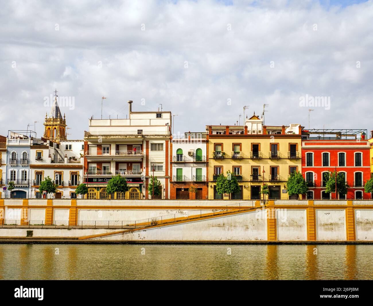 Colourful houses of Triana neighborhood on the River Guadalquivir ...