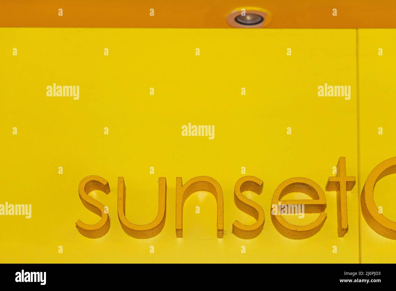 3d Letters Sunset Sign at Yellow Background Stock Photo - Alamy