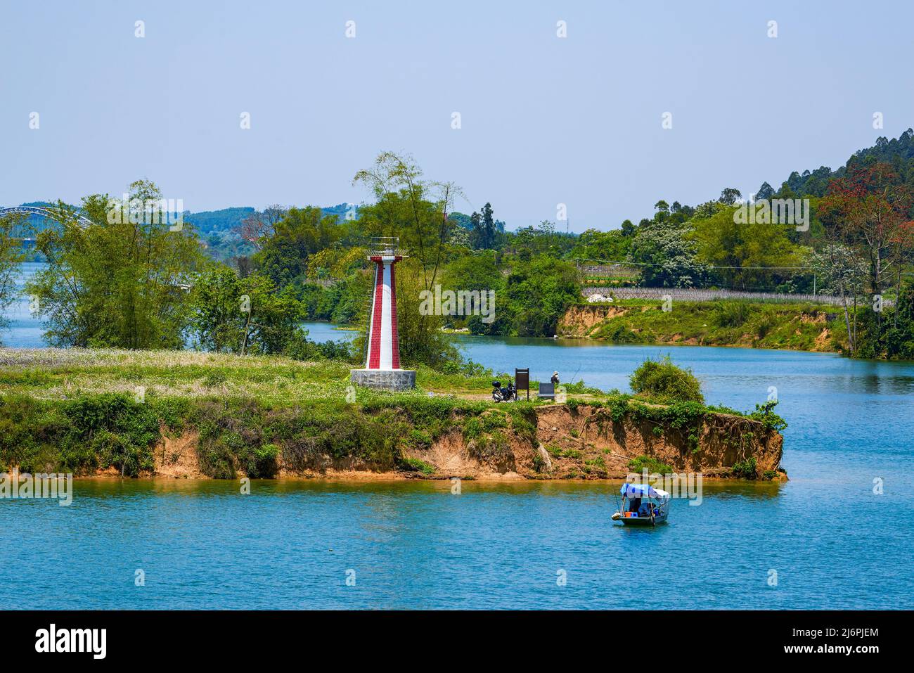 Countryside riverside scenery and sailing lighthouse Stock Photo - Alamy