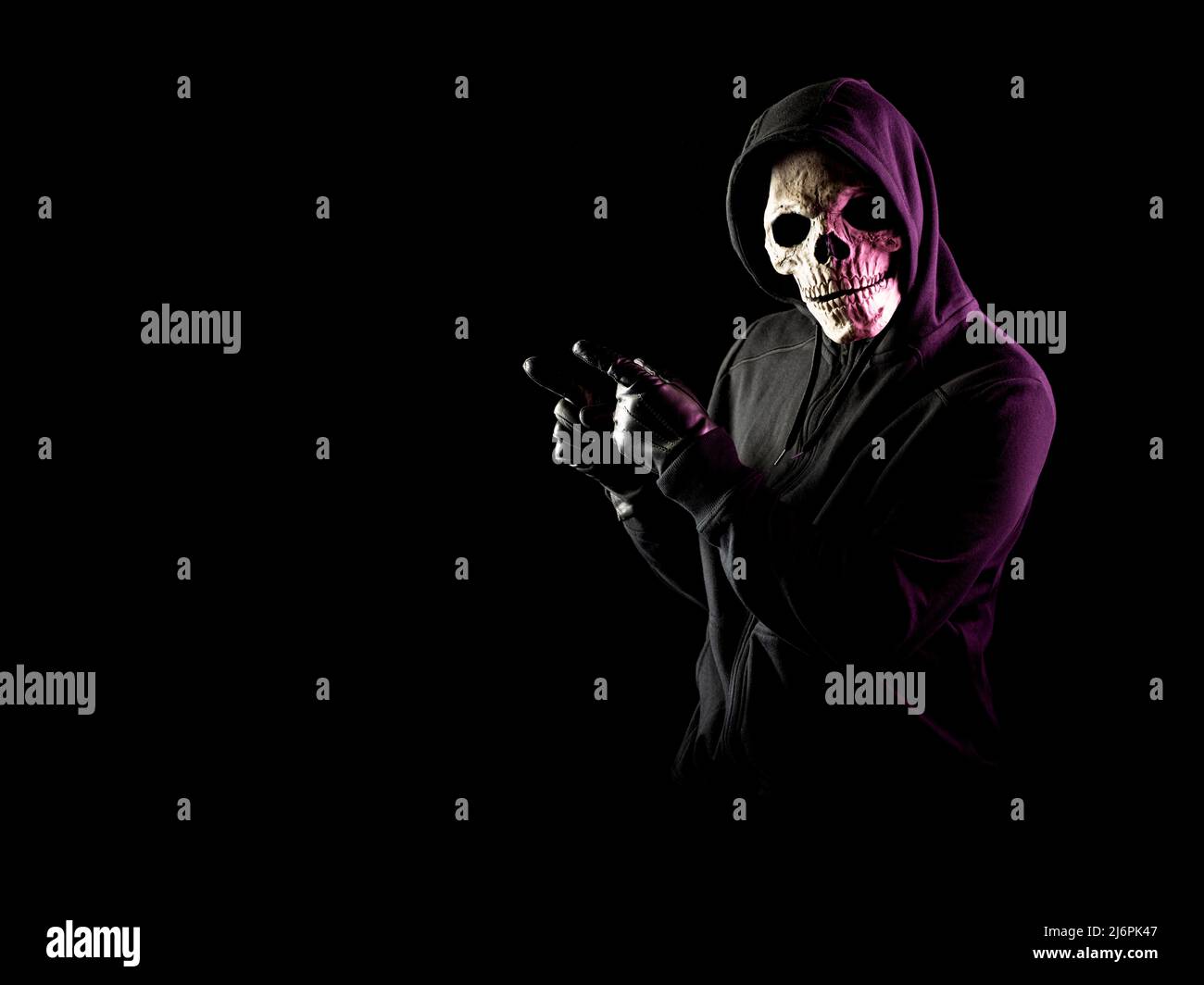 Modern death character on a black background pointing to the left Stock ...