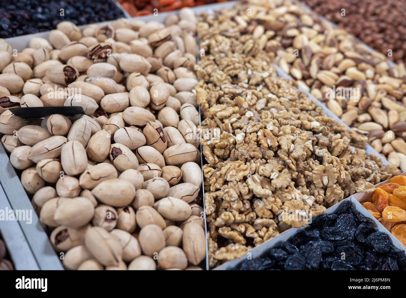 Dried fruits and nuts on local food market Stock Photo - Alamy