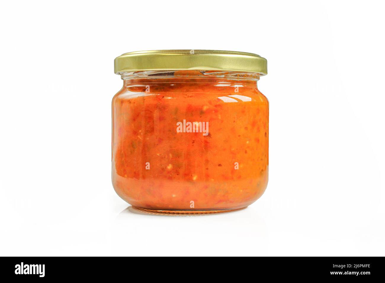 Balkans delicacy Ayvar or Ajvar in glassy jar isolated on white ...