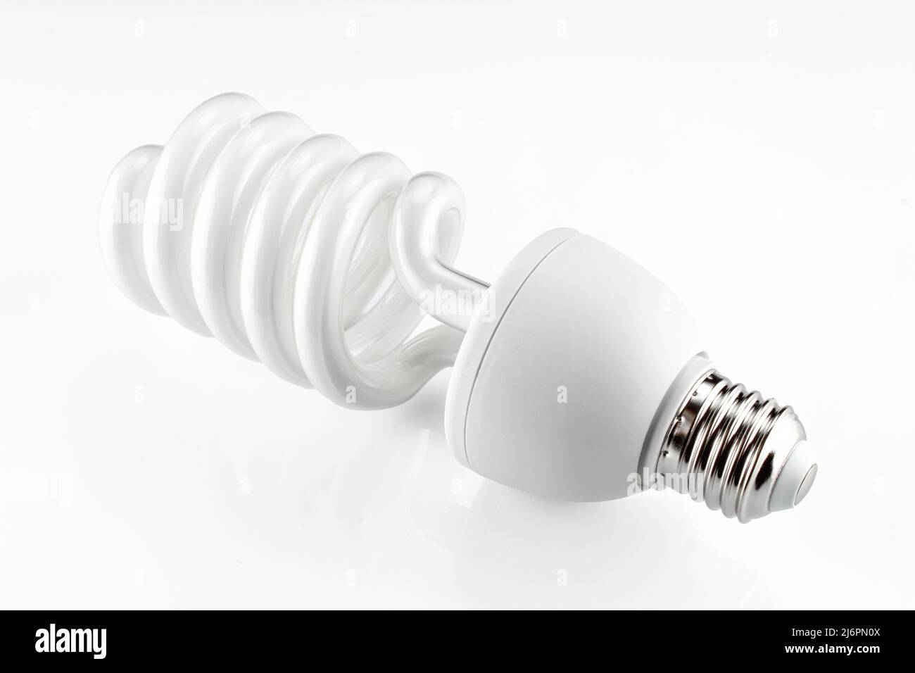 Spiral LED energy-saving light bulb isolated on white background Stock ...