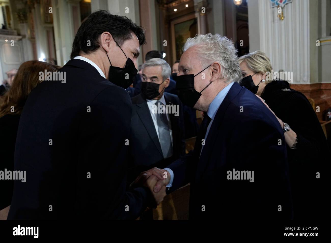 Prime Minister Justin Trudeau (left) talks with federal Conservative ...