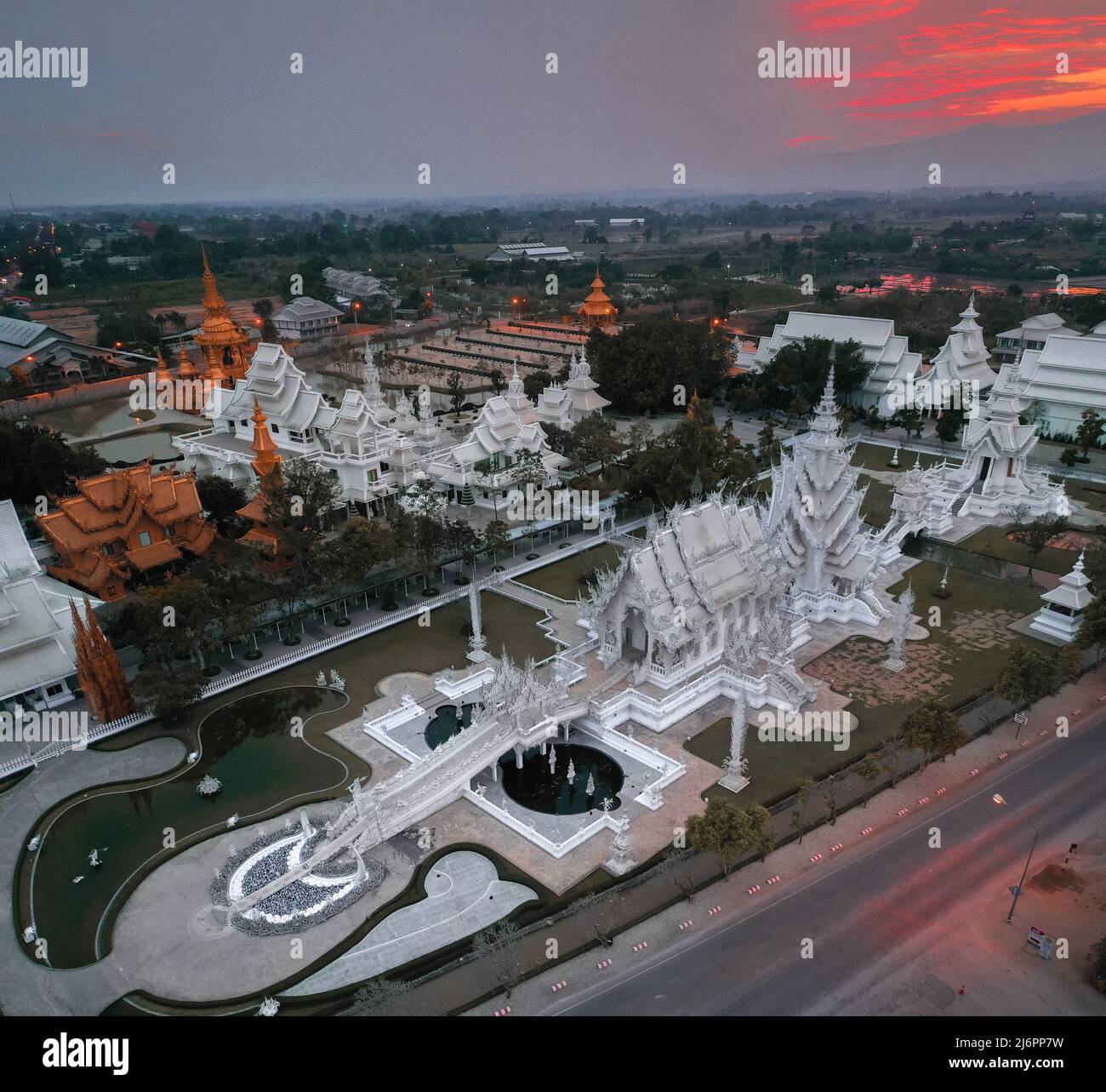 Aerial view of Wat Rong Khun, the white temple, at sunrise, in Chiang ...