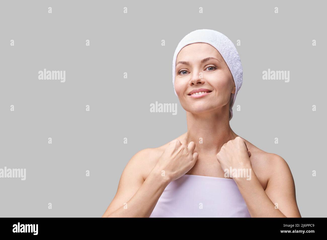 Pure skin care mature beauty portrait. Self massage. Cosmetology ...