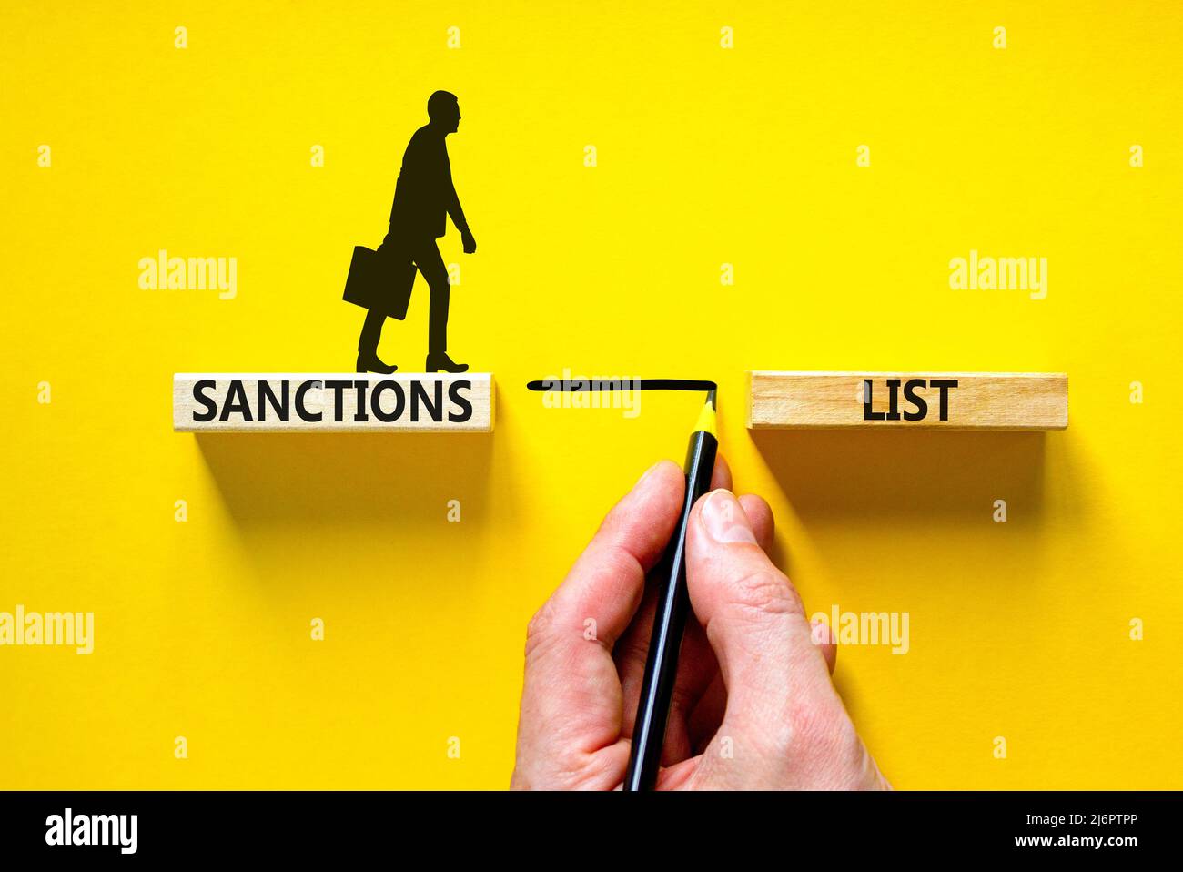 Sanctions list symbol. Wooden blocks with concept words Sanctions list ...