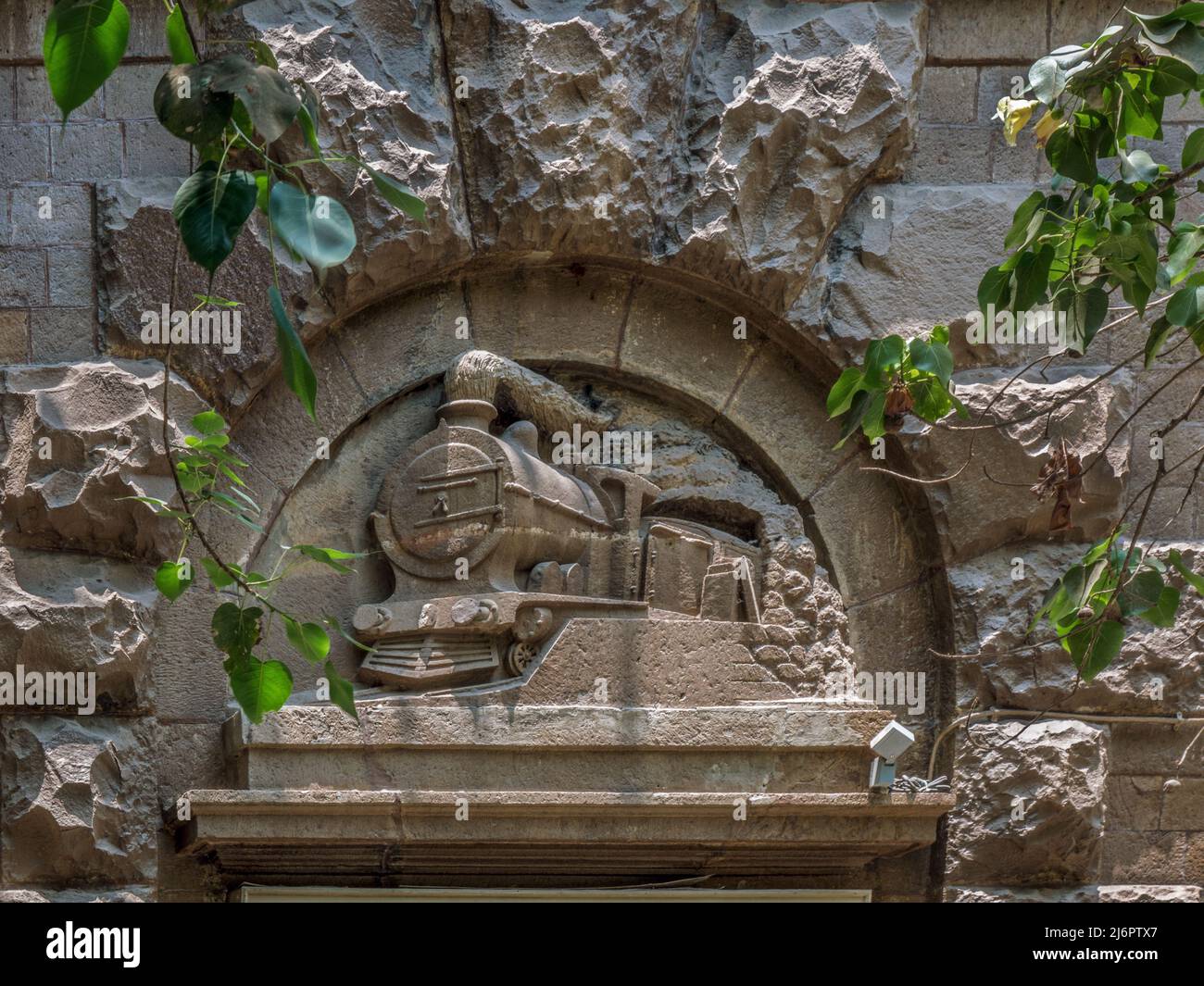 04 30 2022 old steam locomotive is a detail of the door arch of the ...