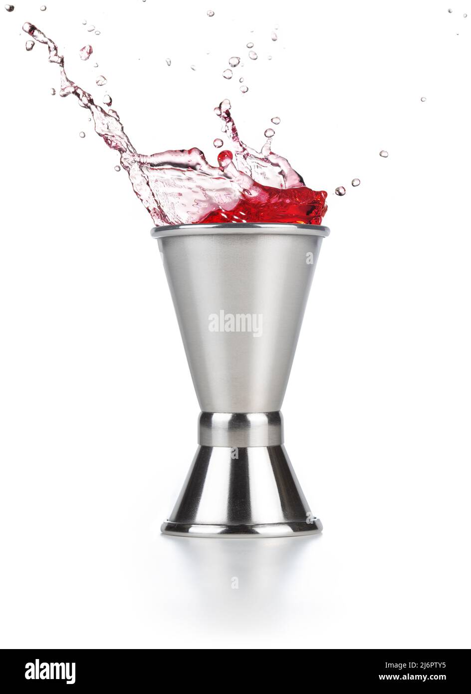 red liquid spilling out of a jigger isolated on white Stock Photo - Alamy